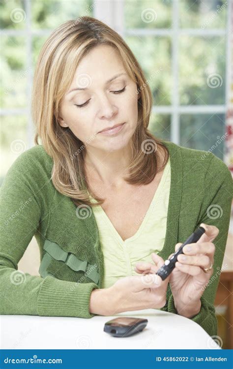 Woman Checking Blood Sugar Level At Home Stock Photo Image Of Home Medicine