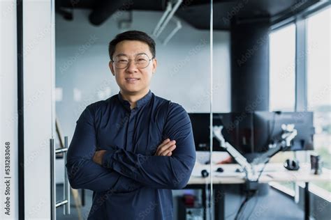 Portrait Of Successful Asian Programmer Team Leader Company Owner Smiling And Looking At Camera