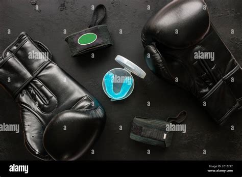 Boxer accessories - gloves, bandages, mouth guard Stock Photo - Alamy