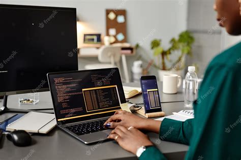 premium photo closeup of female qa engineer typing on keyboard while