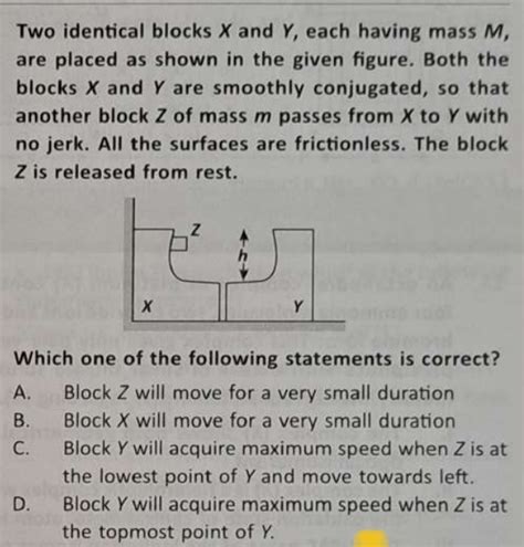 two identical blocks x and y each having mass m are placed as shown in