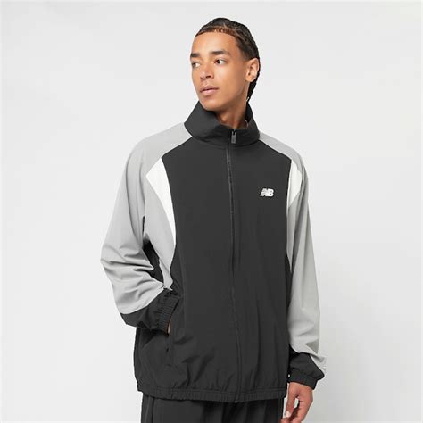 New Balance Woven Track Jacket Zwart Mj51601 Bk