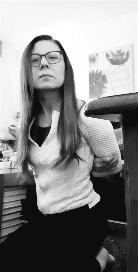 Mature Lady Prays With Arms Crossed Behind Back Scrolller