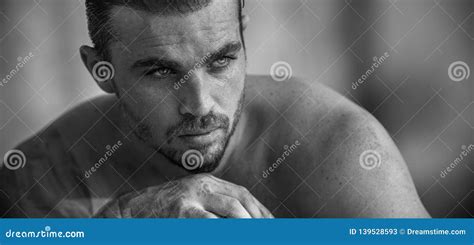 Handsome Caucasian Male Model Posing In Black And White Portrait Stock