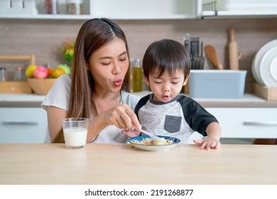 Asian Mother Help Her Son Eat Stock Photo Shutterstock