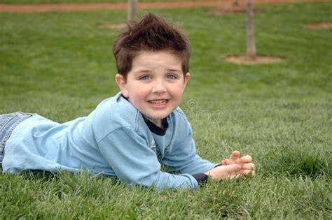 Laying In The Grass Stock Image Image Of Grass Smile 596651