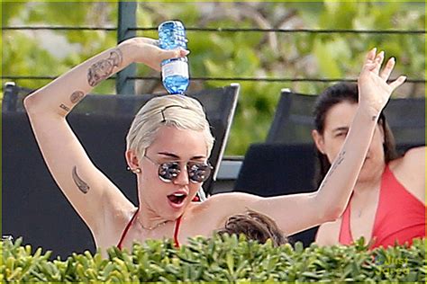 Miley Cyrus Flaunts Her Bikini Body Poolside In Barcelona Photo