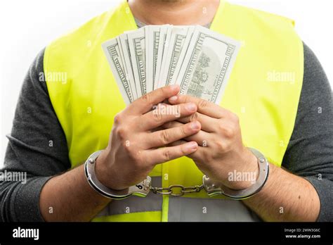 Close Up Of Corrupted Arrested Constructor Man In Handcuffs Wearing Fluorescent Work Equipment