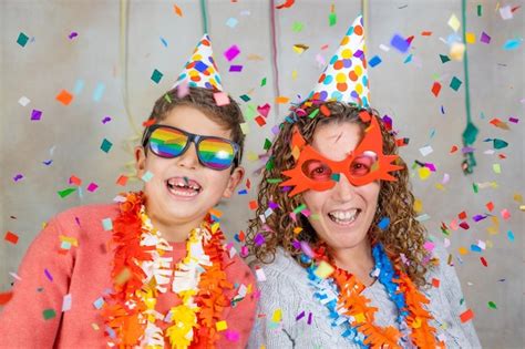 Premium Photo Mother And Son Celebrating A Party At Home