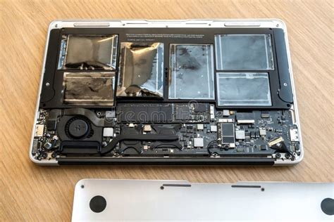 Swollen Battery Of Broken Laptop In Open Casing Closeup Stock Image Image Of Pack Lithiumion