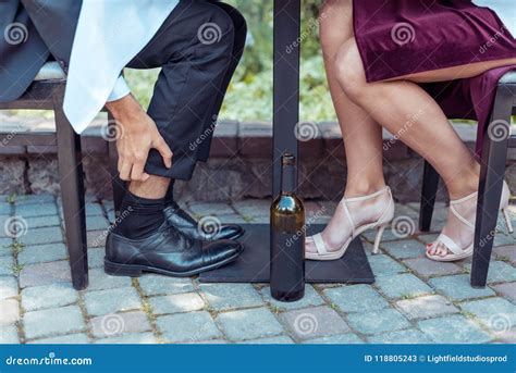Man Scratching His Leg At Table Stock Image Image Of Together Table 118805243