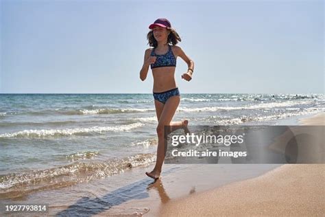 Teenager Girl Running Barefoot In Sand Enjoy The Vacations At The Beach