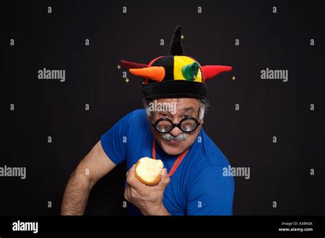 Man With Apple Stock Photo Alamy