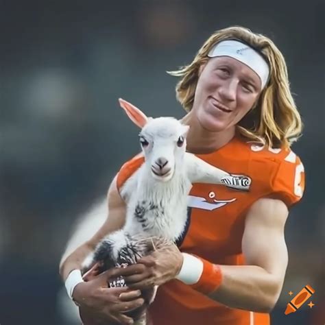 Trevor Lawrence Holding A Baby Goat On Craiyon