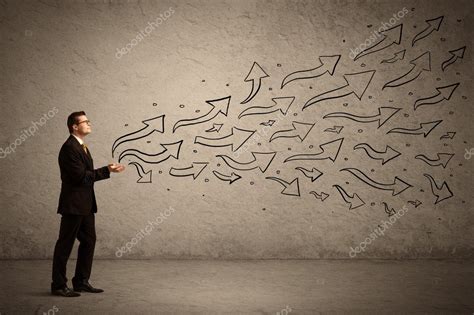 Business Man Holding Arrow Signs Stock Photo By Ra Studio