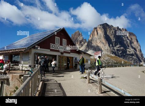 A Sunny Autumn Day On The Sella Pass With A View Of The Sella Range Of
