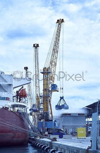 Loading And Unloading Of A Bulk Vessel Stock Photo Crushpixel