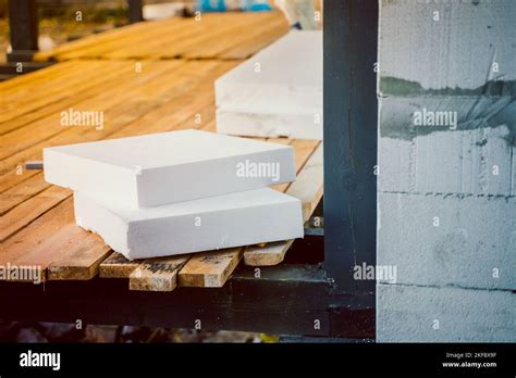 The Process Of External Insulation Of The House With Polystyrene Foam Insulation Two Thick