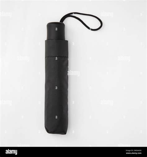 Folded Cover Umbrella Isolated On White Background With Clipping Path