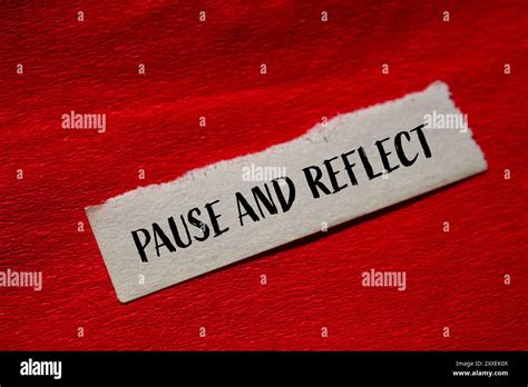 Pause And Reflect Message Written On Torn Paper With Red Background Conceptual Pause And