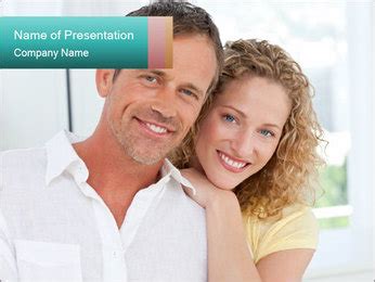 Couple Posing For The Camera At Home With Affection PowerPoint Template Backgrounds Google
