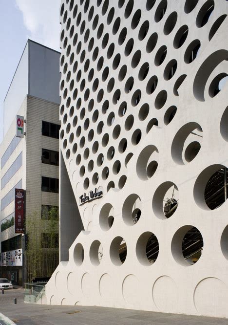 Archiums Urban Hive Tower Has Perforated Facade Modelled On Honeycomb