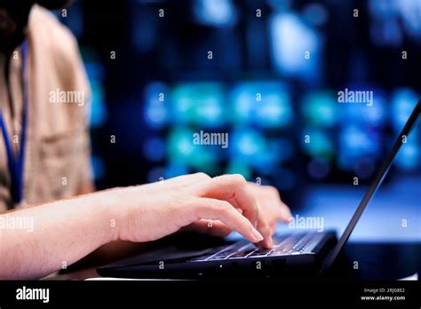 Technician Preventing Strain On High Tech Data Center Infrastructure