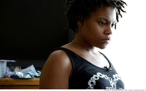A Woman With Dreadlocks Looking At The Camera