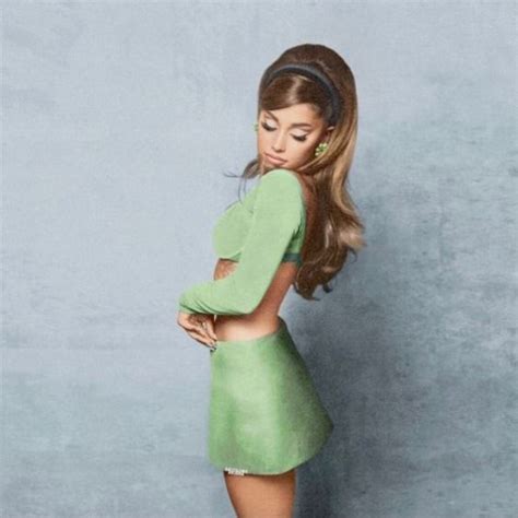 Ariana Grande Brings Back The ‘60s In A Green Go Go Style Crop Top Mini