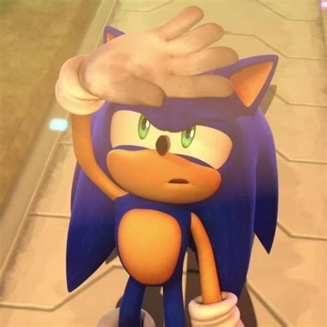 Sonic The Hedgehog Is Standing On A Tile Floor