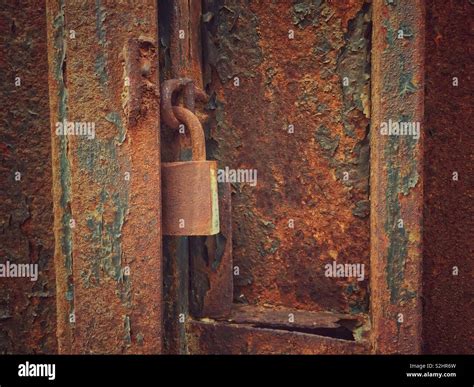 Old Lock On Rusty Gate Stock Photo Alamy