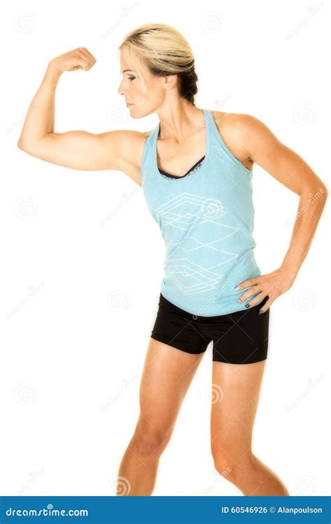 Woman In Blue Fitness Tank Top Pose Look To Side Flex One Arm Stock