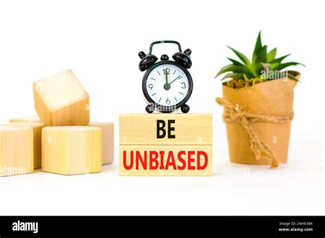 Be Unbiased Symbol Concept Words Be Unbiased On Wooden Block Beautiful White Table White