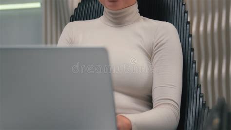Female Woman Businesswoman Hacker User Programmer Coder In Headphones Studying Laptop In Chair