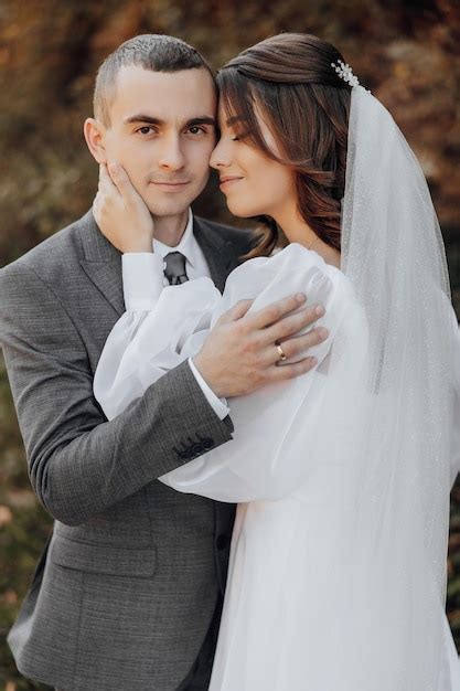 Premium Photo Bride And Groom Having A Romantic Moment On Their Wedding Day Beautiful Veil