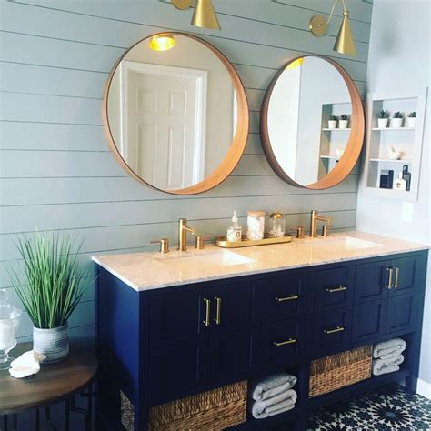 Blue Bathroom Vanity With Double Sink And Round Mirrors