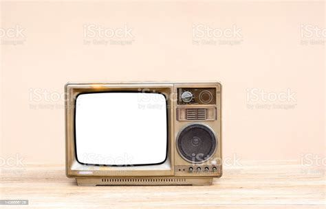 Retro Old Tv Cut Out Screen On Wooden Table With Wall Background Stock