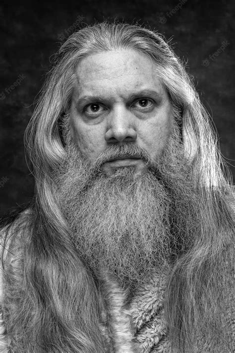 Premium Photo Portrait Of Man With Beard And Long Hair