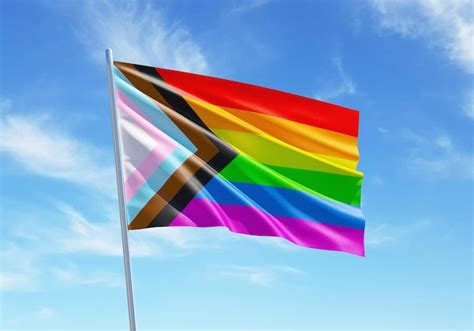 Premium Photo Progress Pride Rainbow Flag Waving In A Blue Sky
