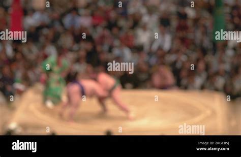 Two Sumos Famous Sumo Wrestlers Fight At Championship Match In Japan Defocused Stock Video