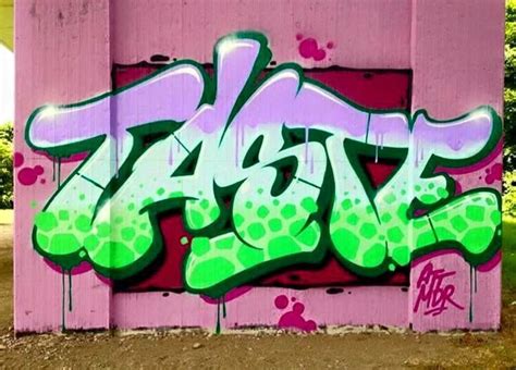 Colorful Graffiti On A Pink Building One Color Graffiti Pink And