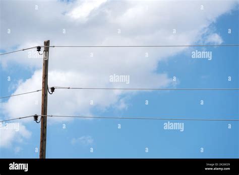 Older Wooden Overhead Power Transmission Line Across The Landscape Stock Photo Alamy