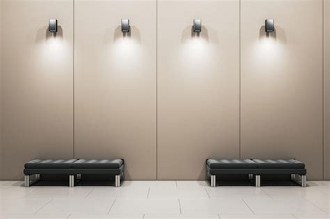 현대적인 전시실 인테리어 가운 벽에 모의 장소 콘크리트 바닥 및 좌석 갤러리 컨셉 3d 렌더링 프리미엄 사진