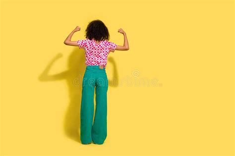 Full Body Rear Portrait Of Confident Lady Raise Fists Flex Biceps Empty Space Ad Isolated On