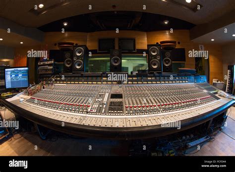 Side View Of Ssl E Series Sound Mixing Desk With Focal Professional Twin Be And Pro Ac Studio