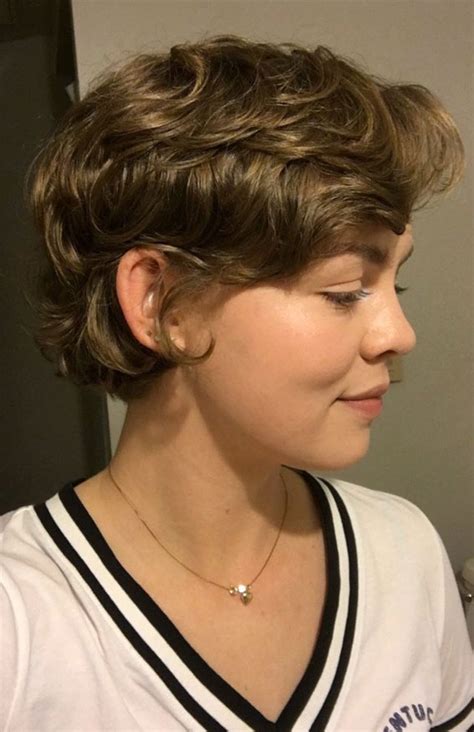 Natural Curl Hair Bixie Haircut With Side Swept Bangs