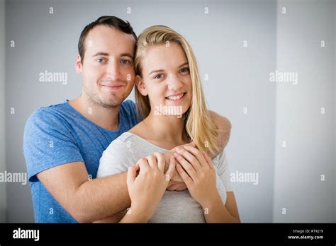 Brother And Sister Posing For A Photo Together Hugging And Smiling Feeling Caring And Loved