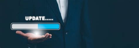 Premium Photo Businessman Hand Hold Bar Of Update Software Computer Program Upgrade Business