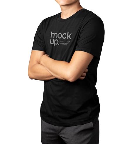 Premium PSD A Man Wearing A Black Shirt That Says Mock Up