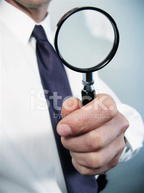 Hand And Magnifying Lens Stock Photo Royalty Free FreeImages